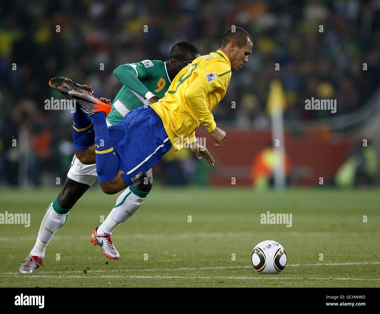 Brazil's clemente luis fabiano (left) and ivory coast's cheick tiote ...