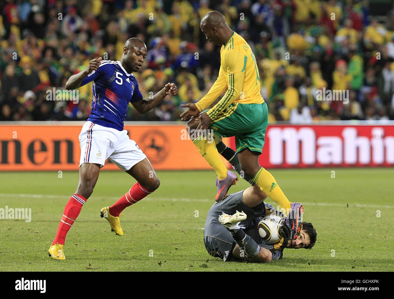 France goalkeeper Hugo Lloris (right) collects the ball under pressure ...