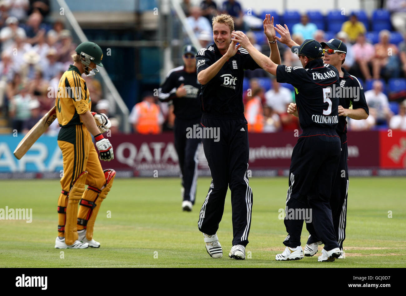 England's Stuart Broad celebrates with Paul Collingwood after taking ...