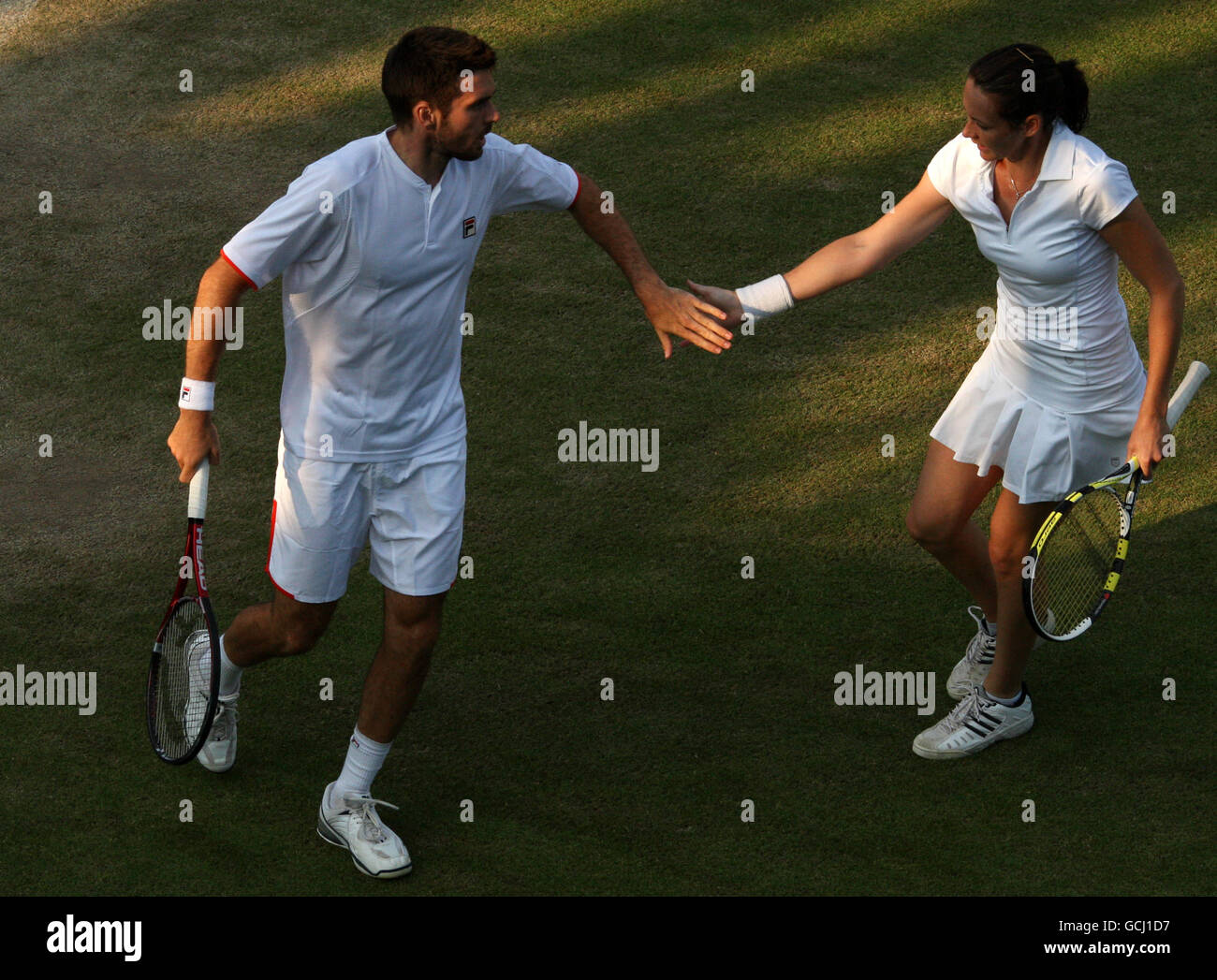 Great Britain's Colin Fleming (left) and Sarah Borwell (right) shake ...