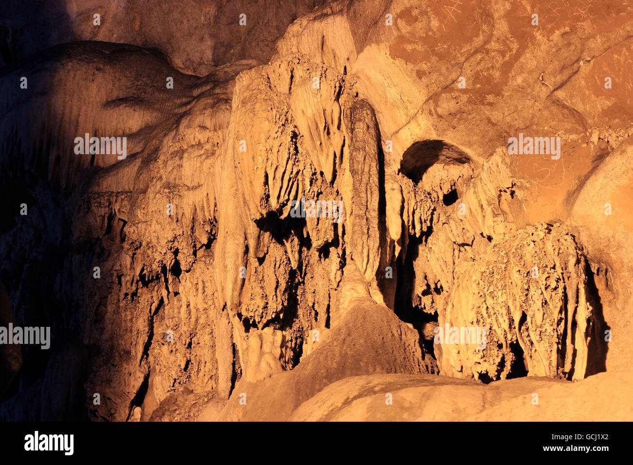 Colorful cave stalactites formation. Close up of colorful natural ...