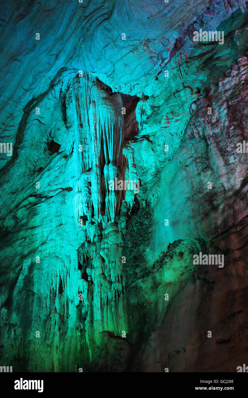 Colorful cave stalactites formation. Close up of colorful natural ...