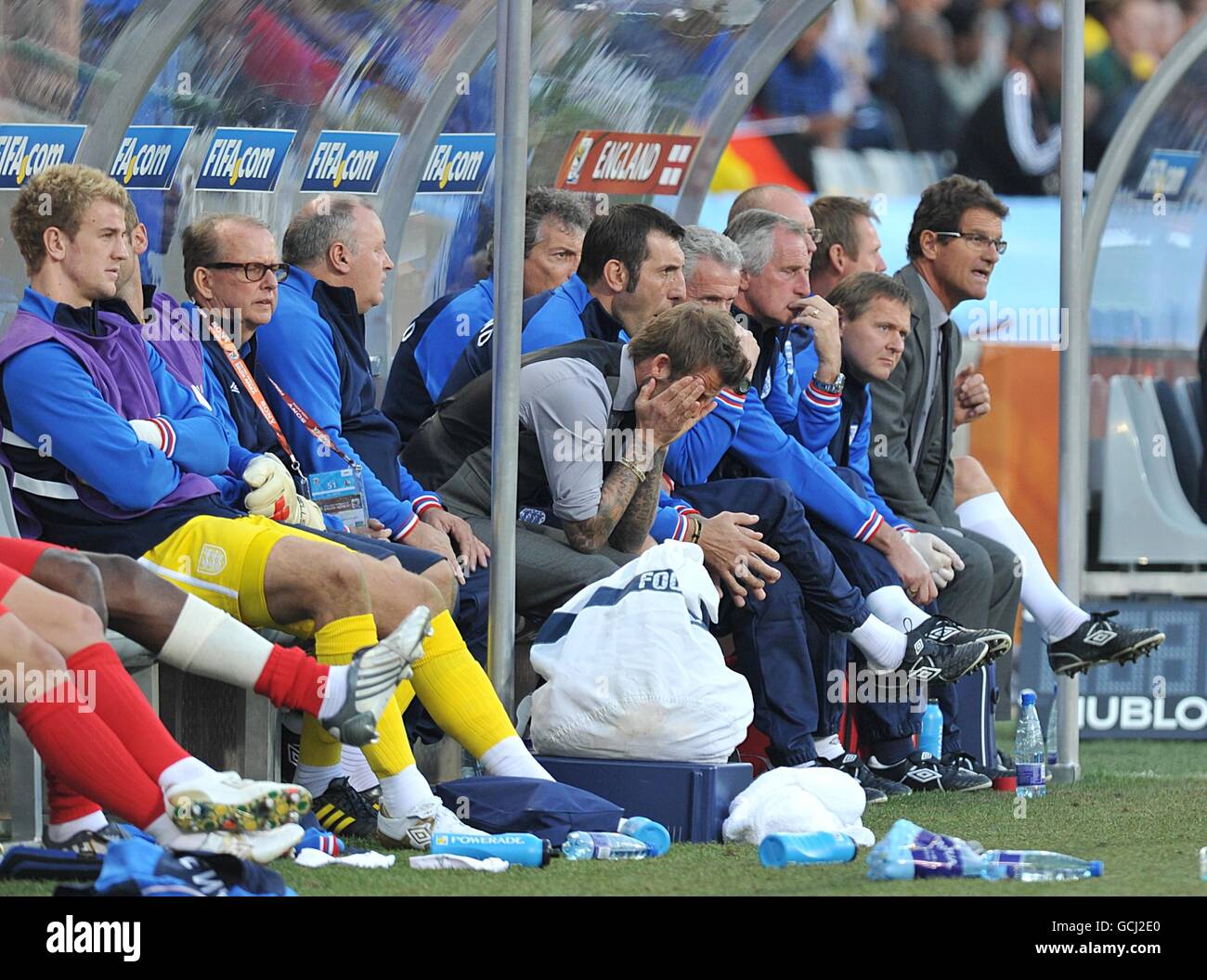 David Beckham (centre) with his head in his hands during the second ...