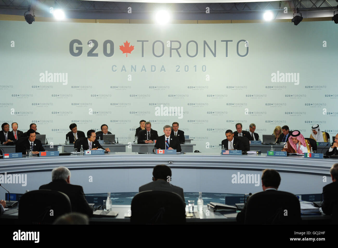 Canadian Prime Minister Stephen Harper (centre) addresses the opening ...
