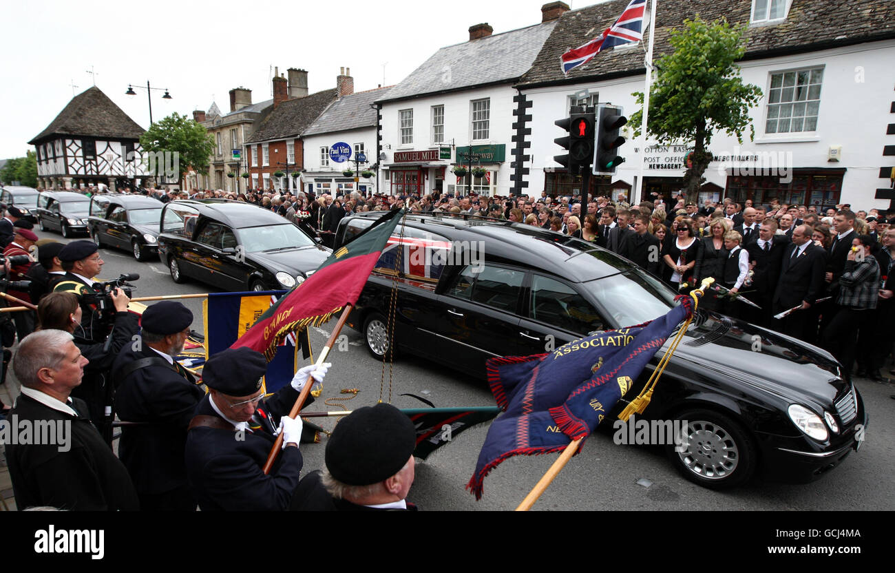 The coffins of Marine Anthony Hotine, 21, Corporal Terry Webster, 24 ...