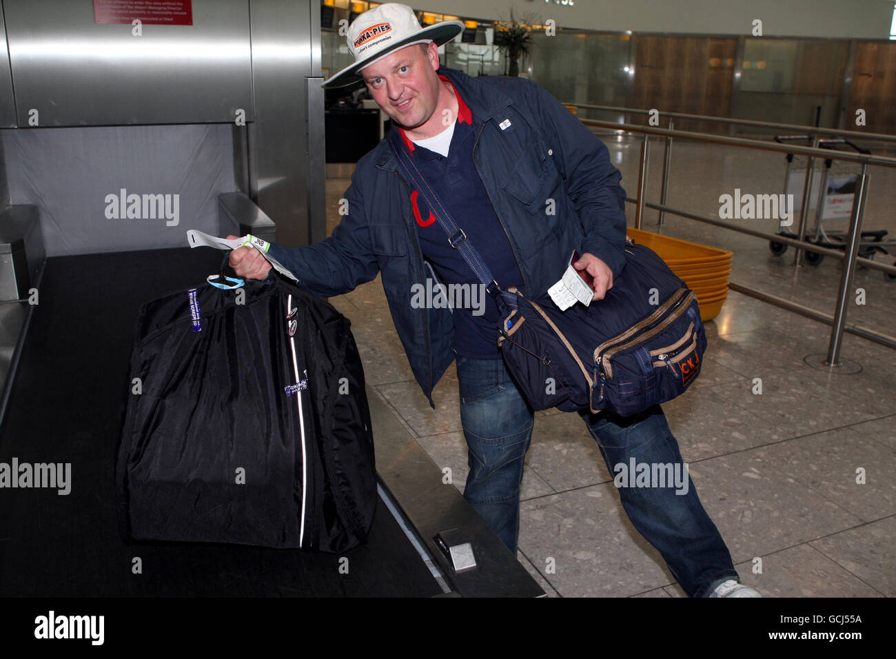 England fans leave for the World Cup - Heathrow Airport. Members of the ...