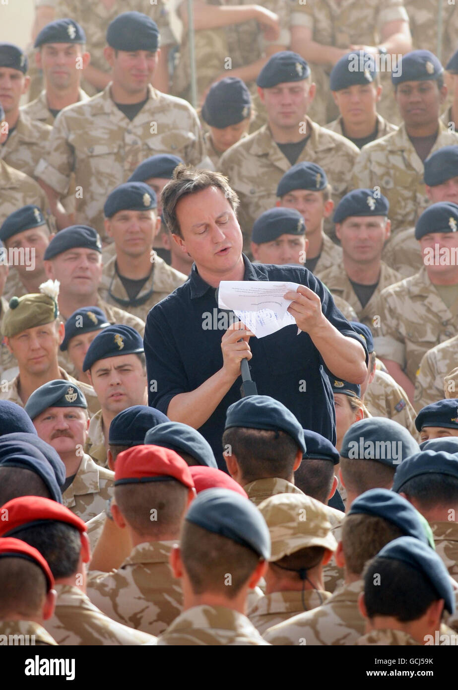 Prime Minister David Cameron reads out a message to British soldiers ...