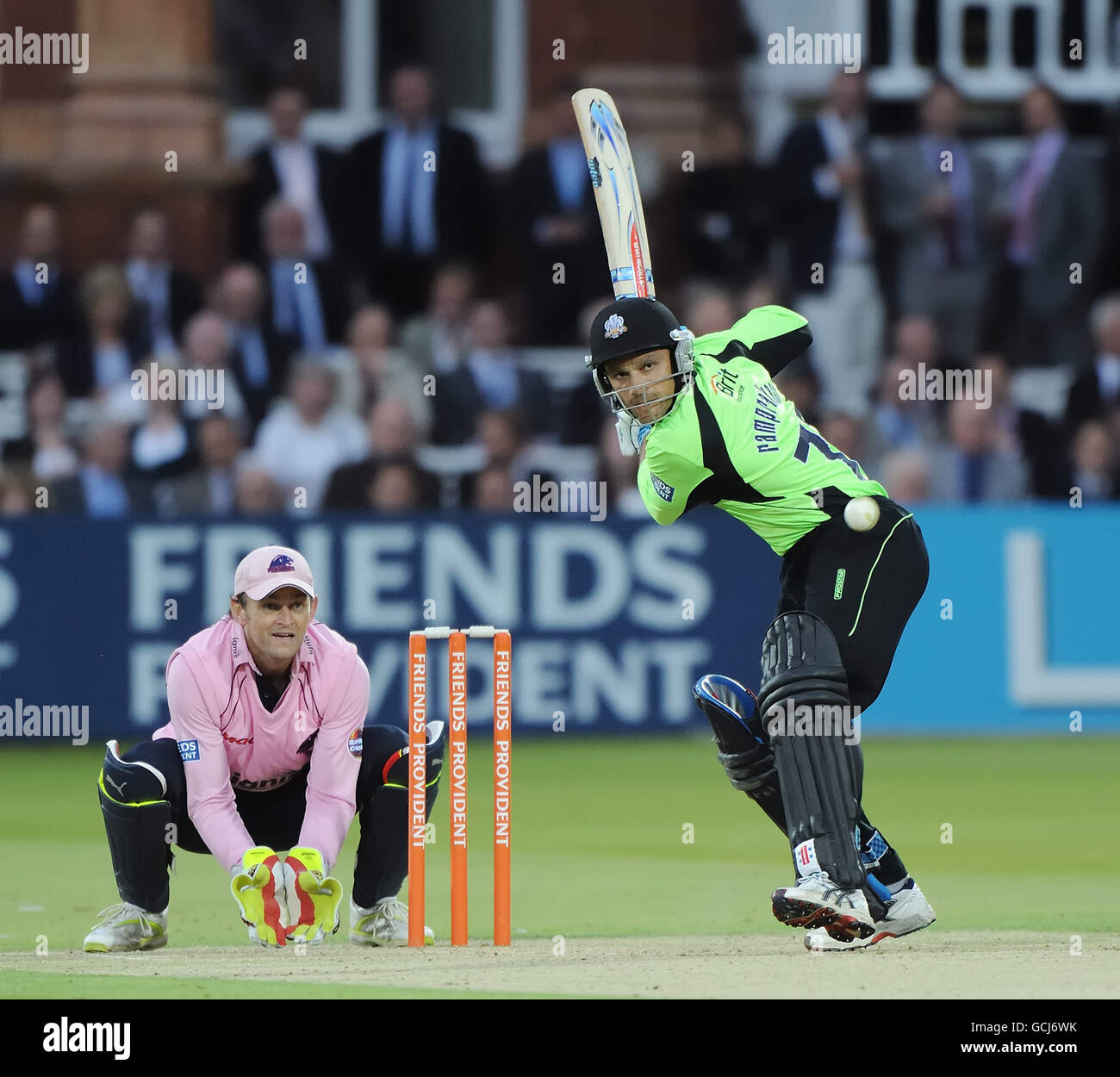 Mark Ramprakash of Surrey comes down the wicket to a ball from the ...