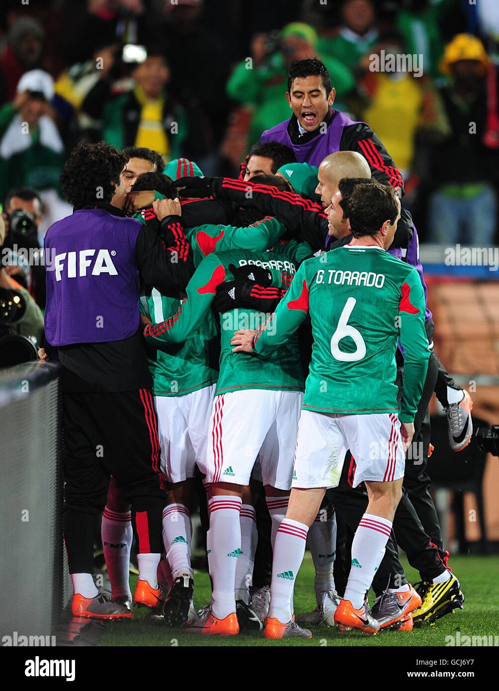 The Mexican team celebrate after Cuauhtemoc Blanco scored their second ...