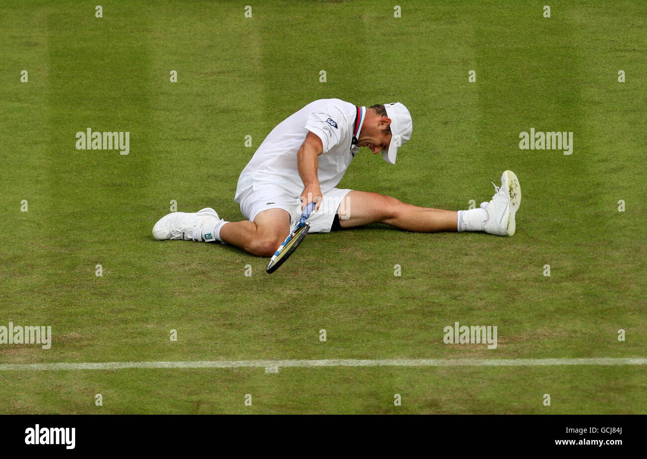 USA's Andy Roddick falls in his match against USA's Rajeev Ram during ...