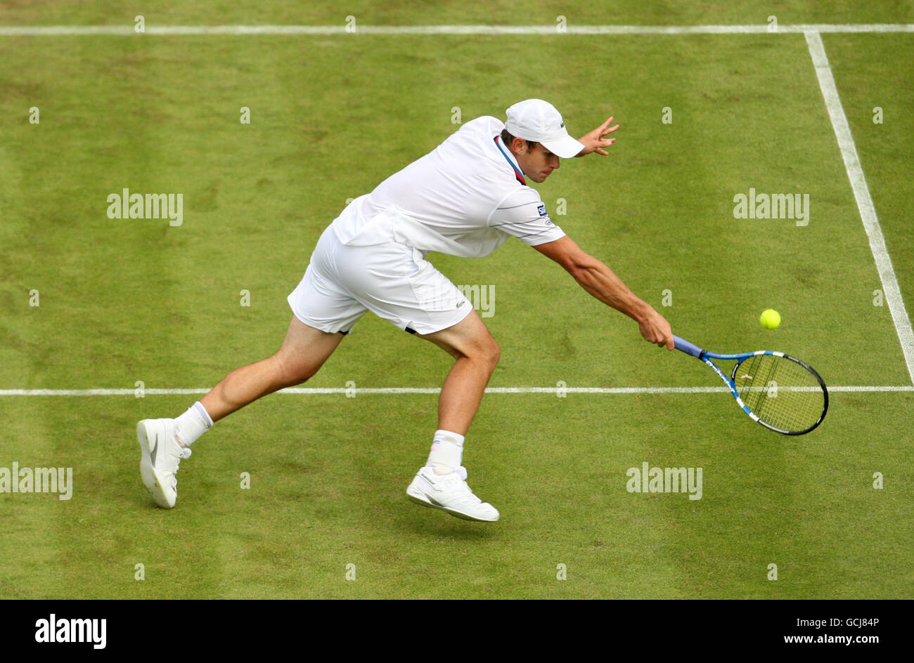 10090 tennis wimbledon ball racket hitting cap mangis hi-res stock ...