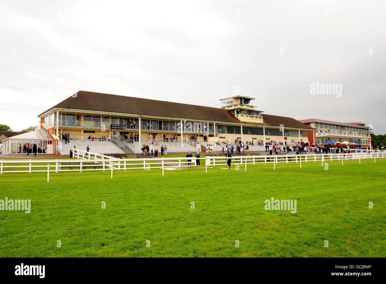 Horse racing racing and music night lingfield park racecourse hi-res ...