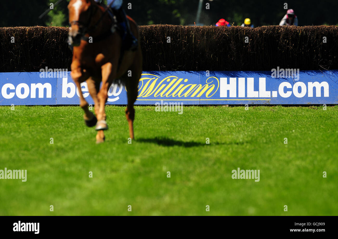 General view of a William Hill branded fence at Worcester Racecourse ...
