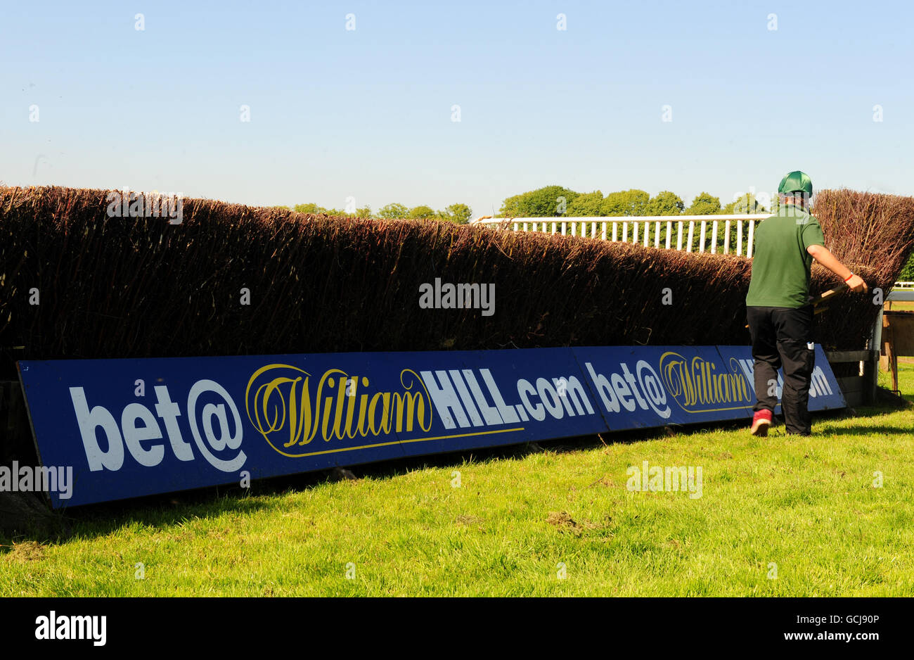 General view of a William Hill branded fence at Worcester Racecourse ...