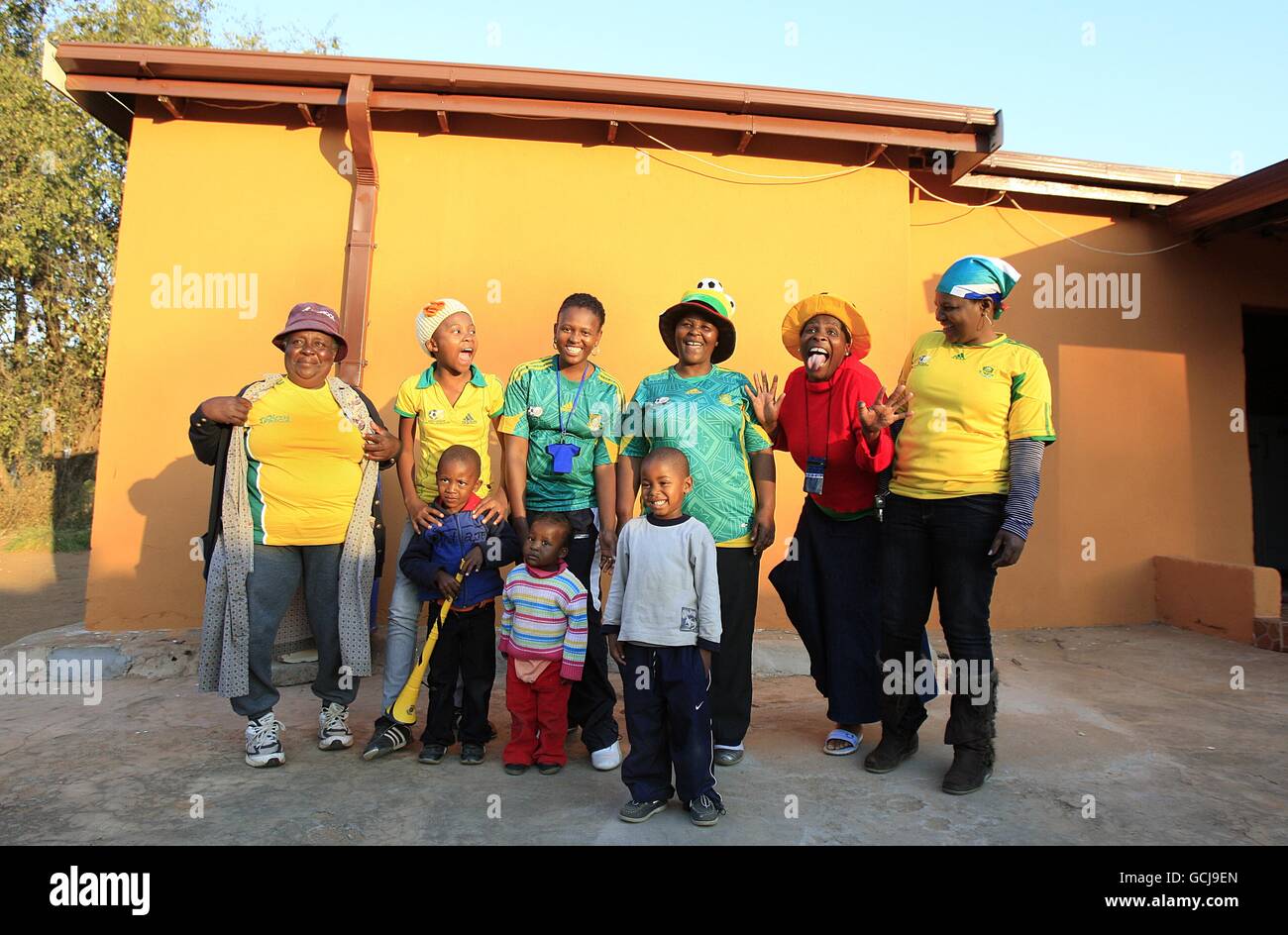 A local family pose for a photograph near to the Royal Bafokeng Stadium ...