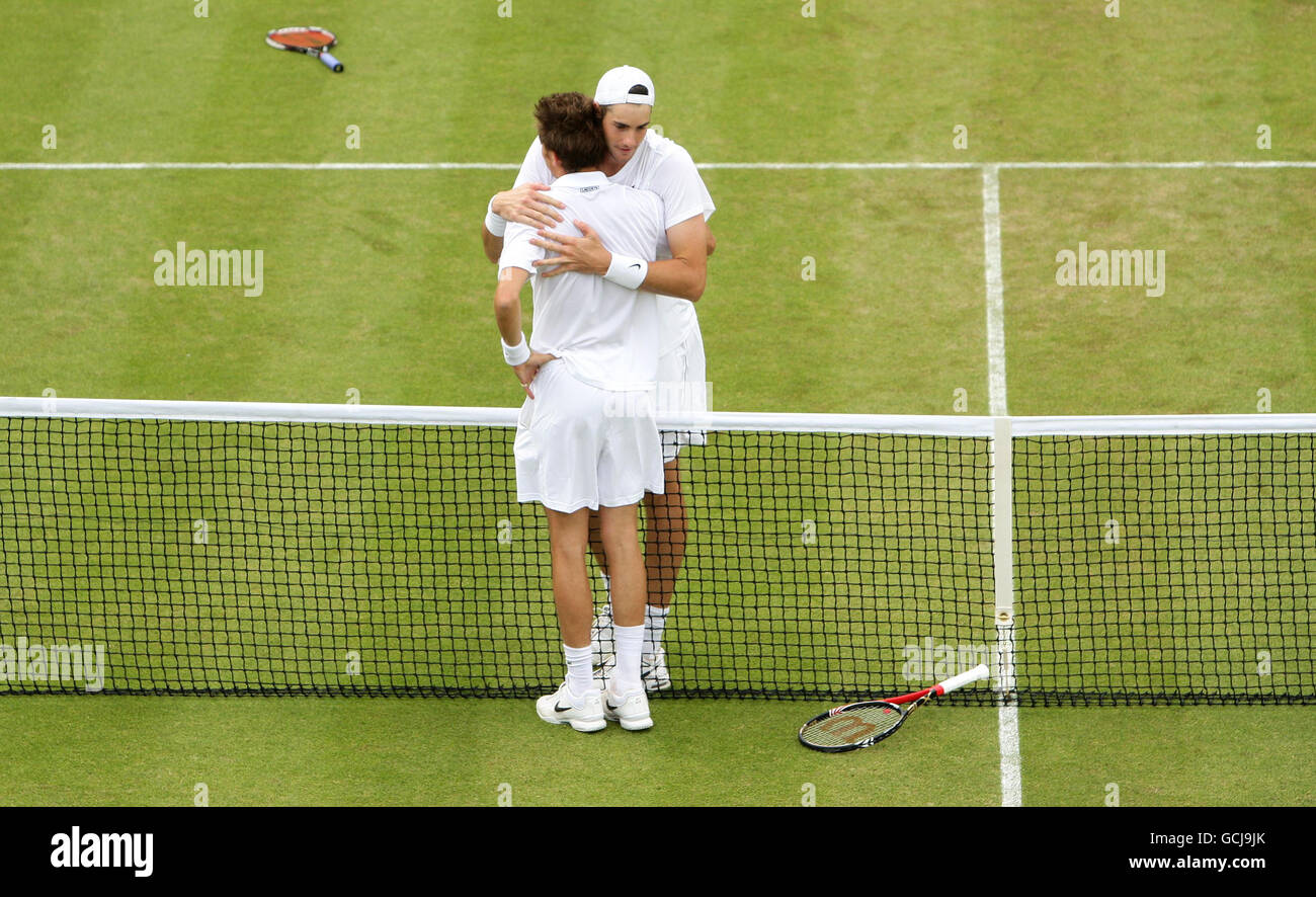 USA's John Isner (back) hugs France's Nicolas Mahut after his victory ...