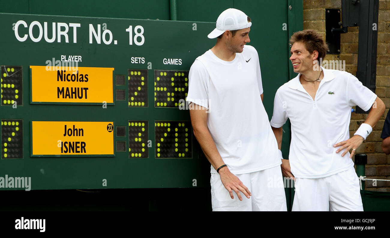 USA's John Isner celebrates victory over France's Nicolas Mahut (right ...