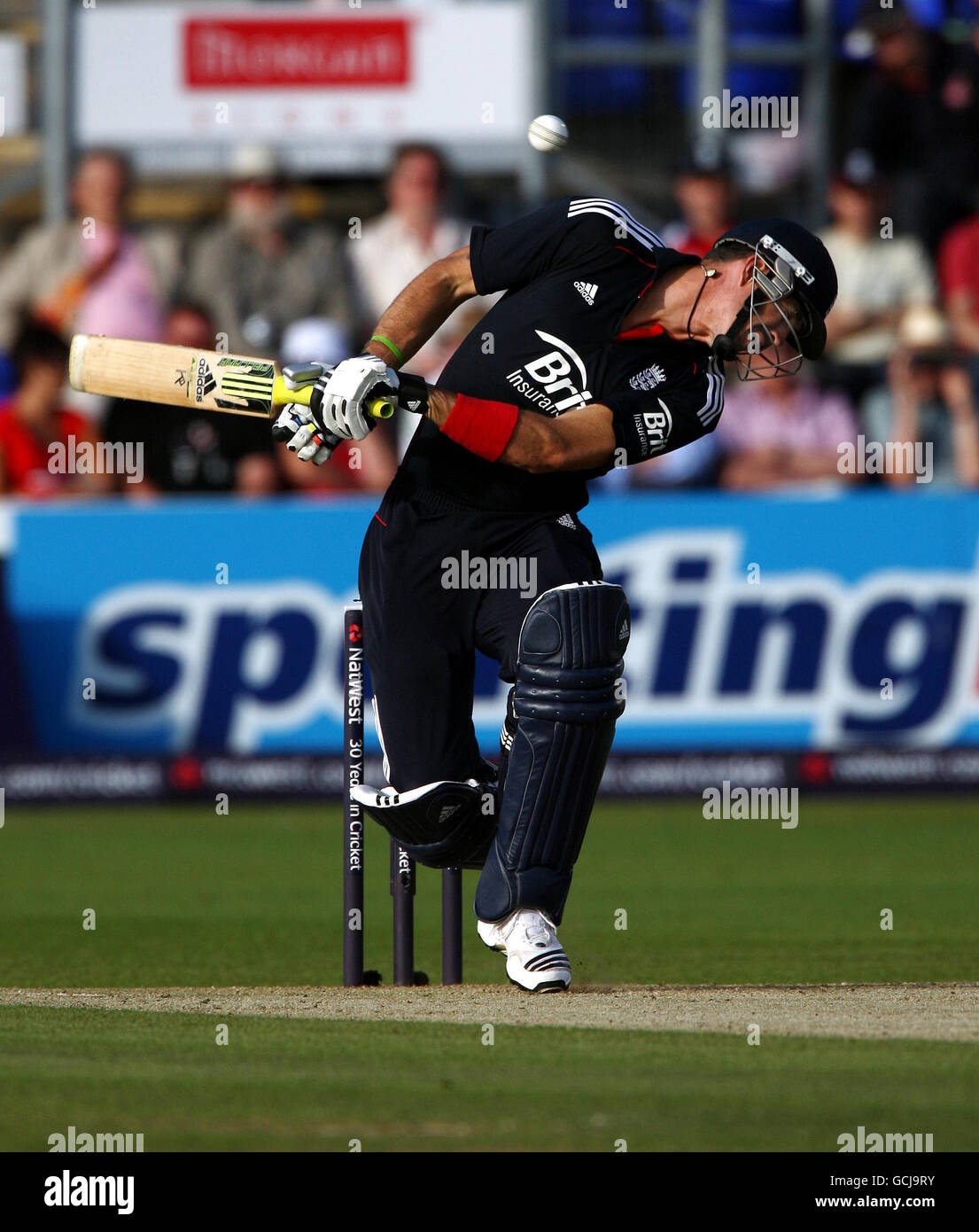 England's Kevin Pietersen sways from a bouncer from Australia's Doug ...