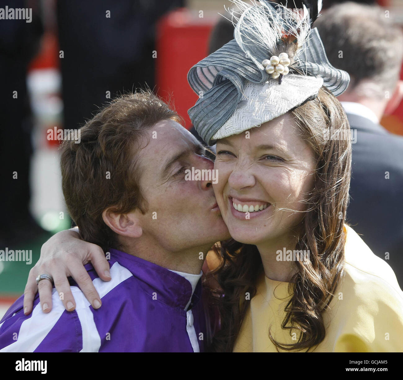 Johnny Murtagh kisses his wife Orla after riding Cape Blanco to victory ...