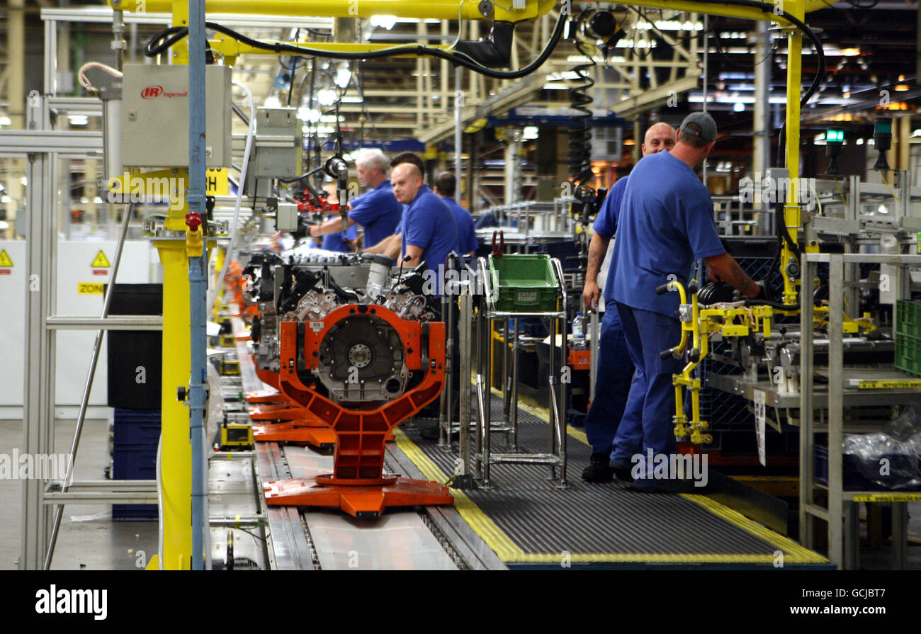 Engineers working on a Jaguar V8 engine at the Ford engine plant near ...