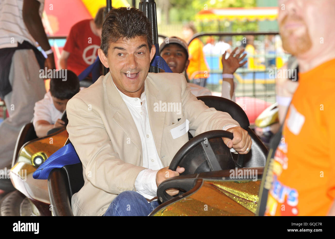 John Altman, aka Nick Cotton from Eastenders, on the dodgems at the ...