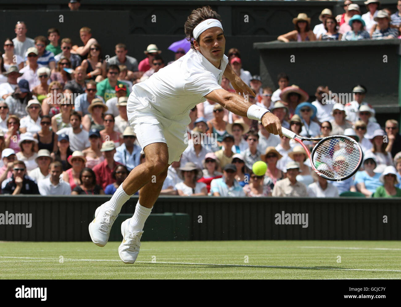 Switzerland's Roger Federer in action against Czech Republic's Tomas ...