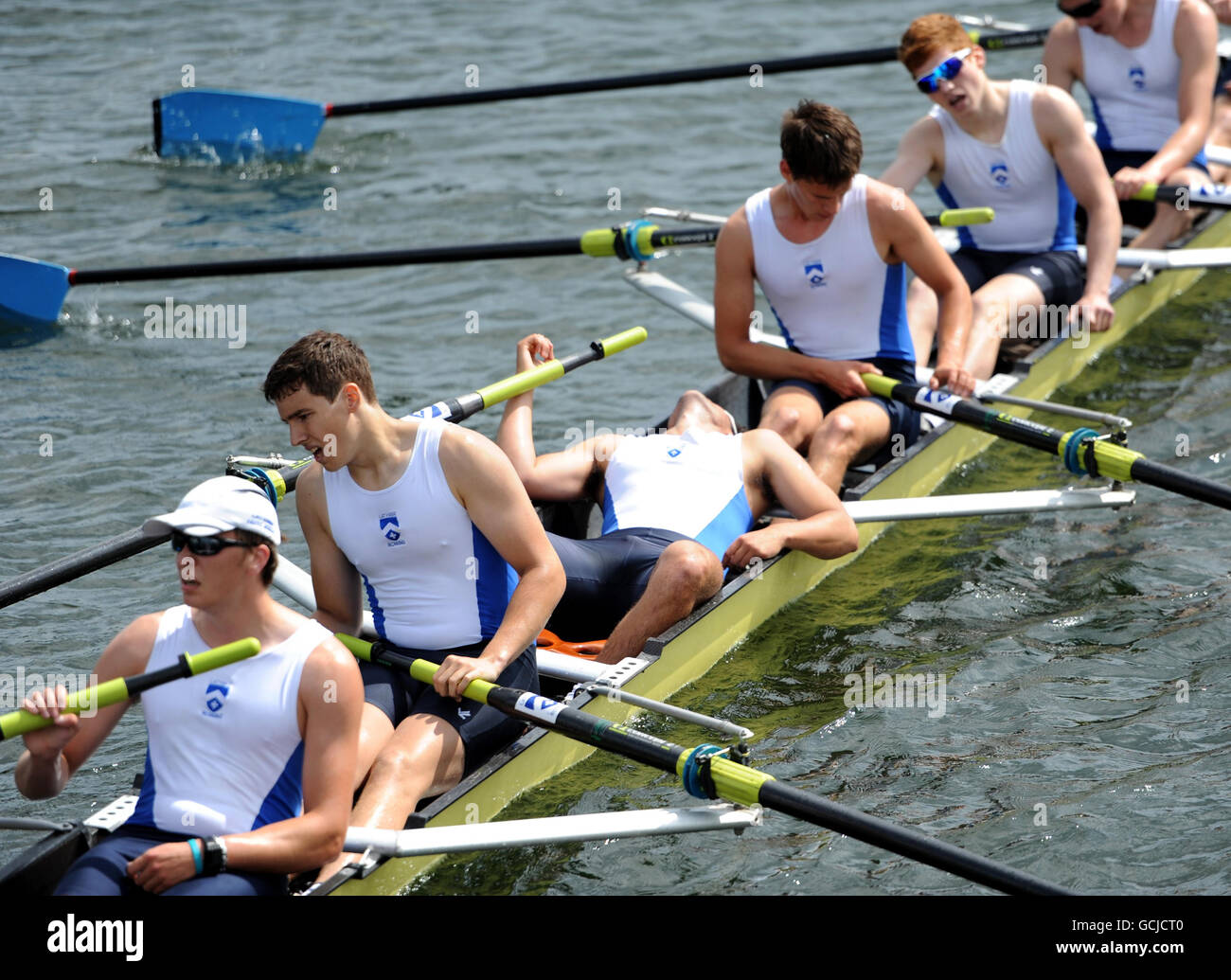 A rower from Latymer Upper School show collapses exhausted after his ...