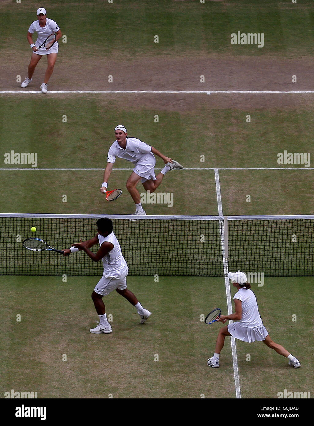 USA's Lisa Raymond and South Africa's Wesley Moodie India's in action ...