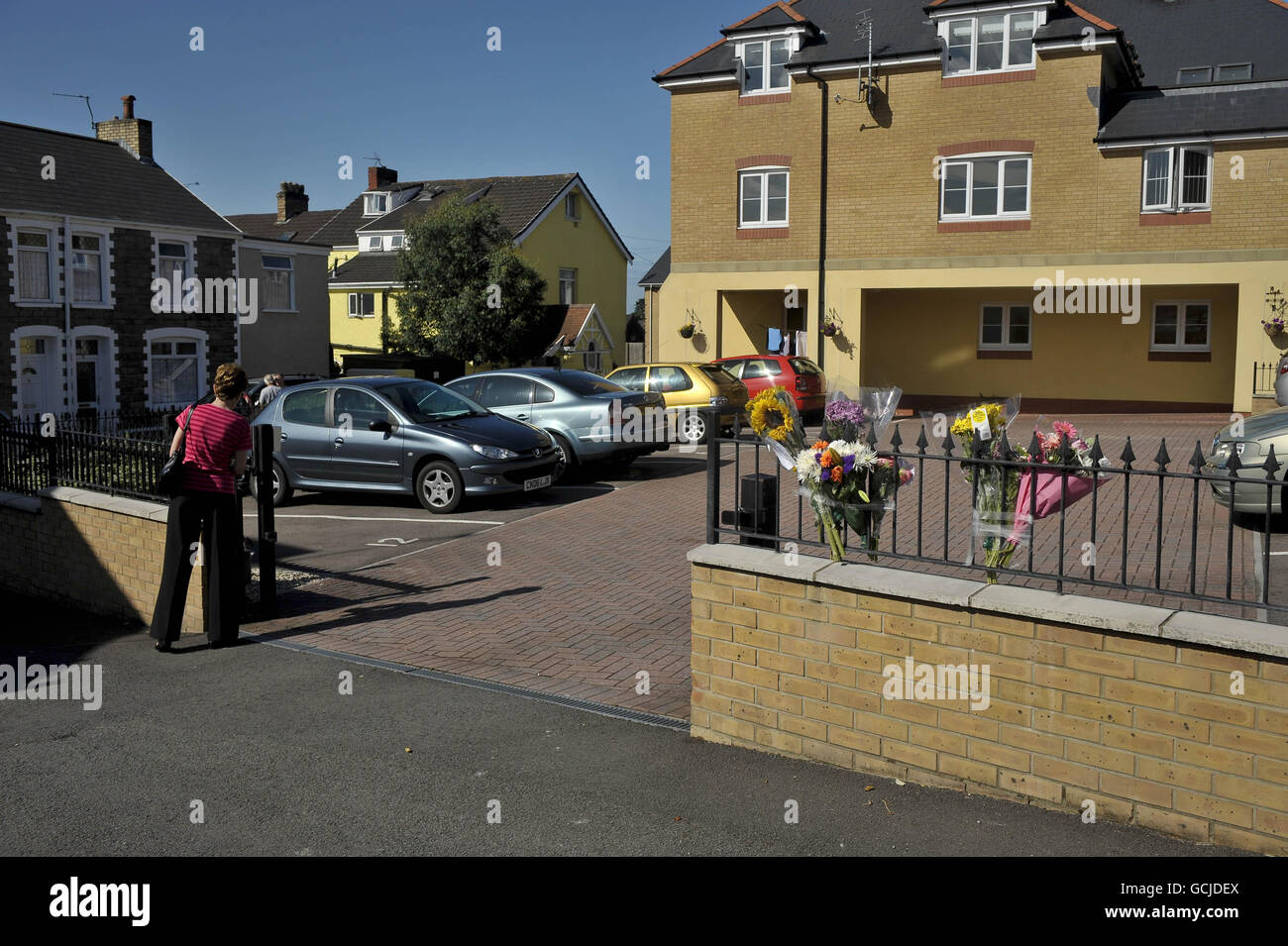 Girl trapped by gate Stock Photo - Alamy