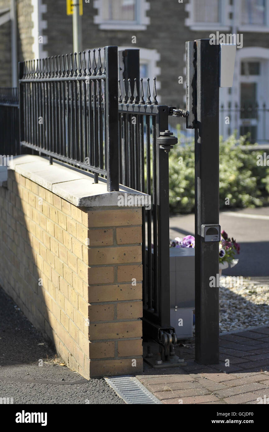 Girl trapped by gate Stock Photo - Alamy