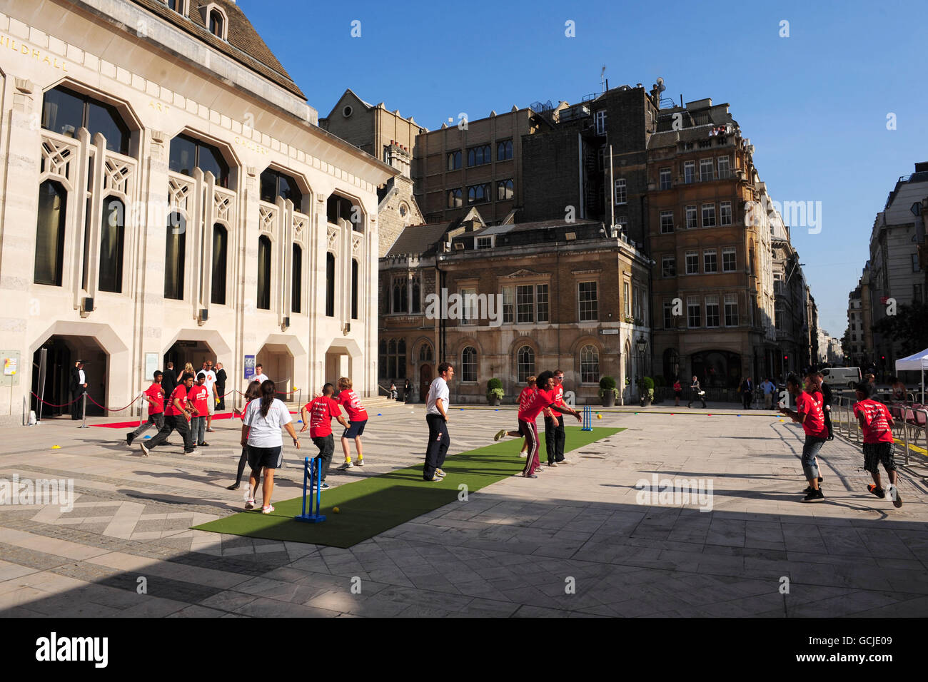 Kids from Pitch Perfect warm up with their coach prior to playing ...