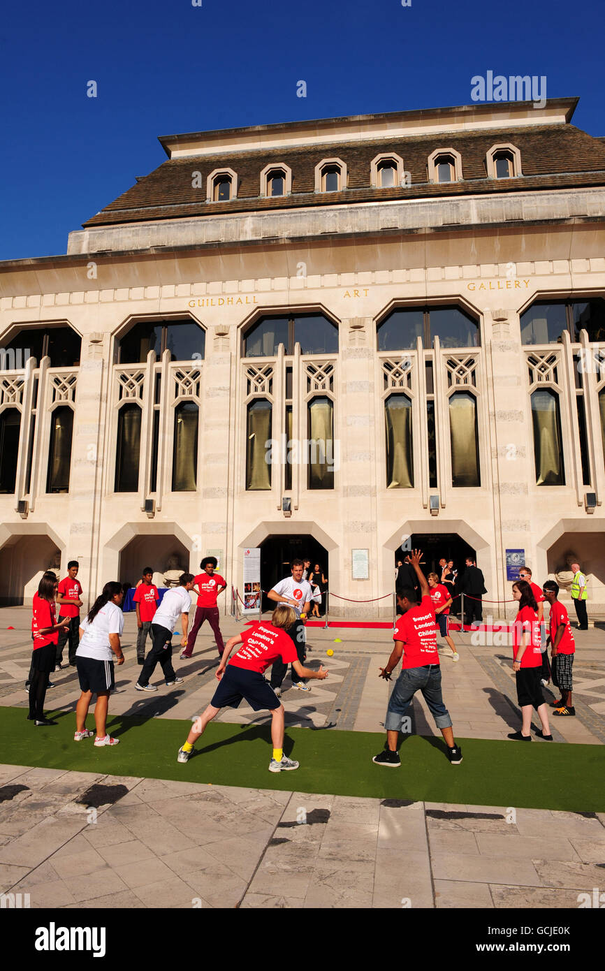 Kids from Pitch Perfect warm up with their coach prior to playing ...