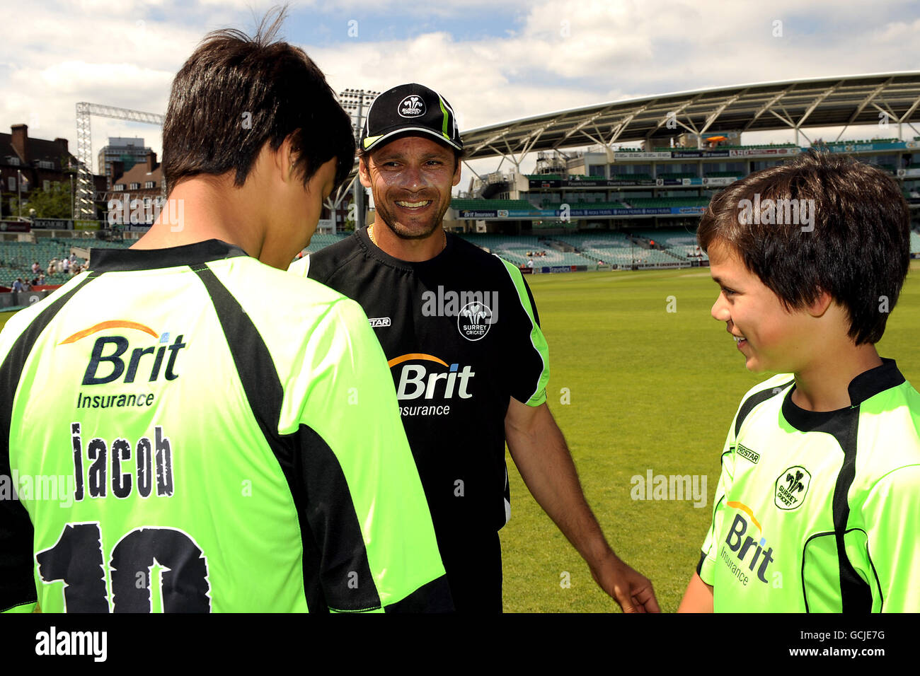 Surrey's Mark Ramprakash talks to the mascots prior to the match Stock ...