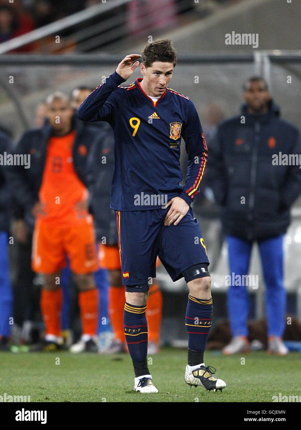 Spains fernando torres gestures after pulling up with an injury hi-res ...