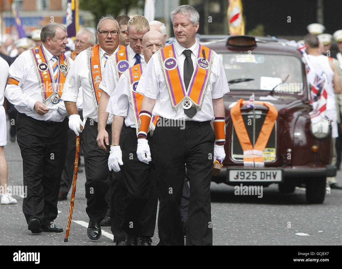 Orange Men take the streets of Belfast for the annual 12th of July ...