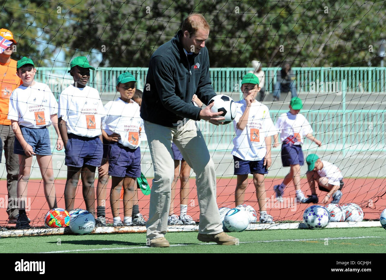 Prince William plays in goal during a visit to the Coaching for Conservation project in Maun ...