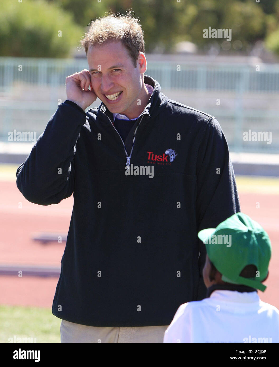 Prince William winces as a young child plays the 'Vuvuzela' during a ...