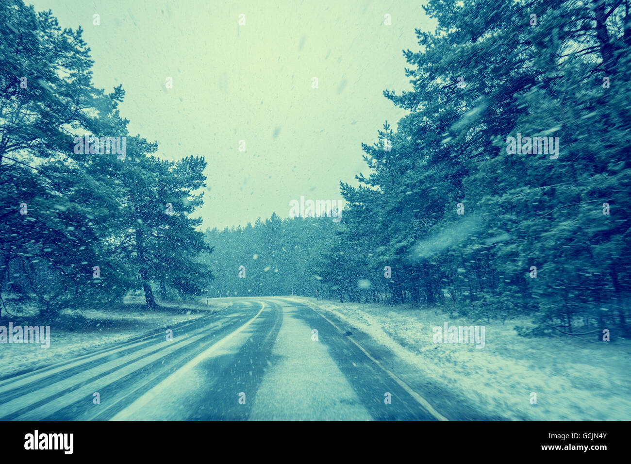 Winter snowy road Stock Photo - Alamy