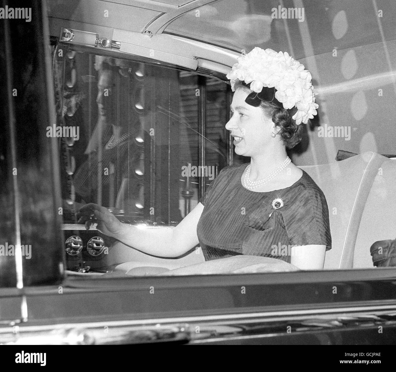 Queen Elizabeth II leaves Buckingham Palace by car on her way to ...