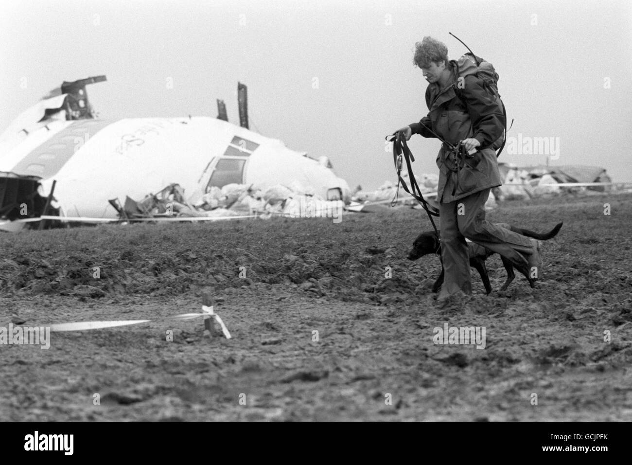 A member of the mountain rescue team helping in the search around ...
