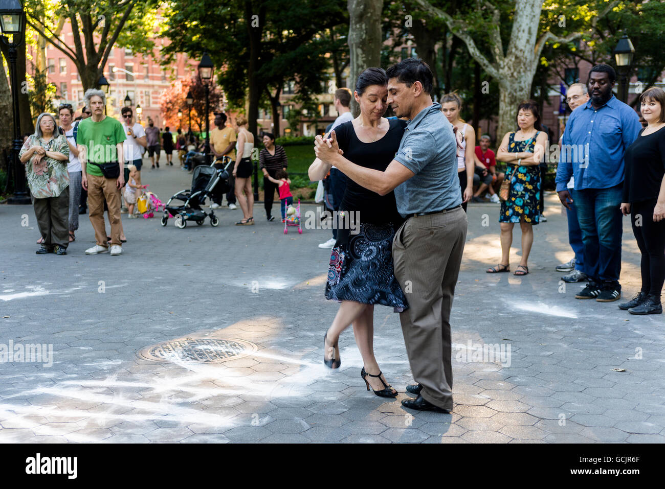 New York, NY - Adults of all ages learn to tango in Washington Square ...