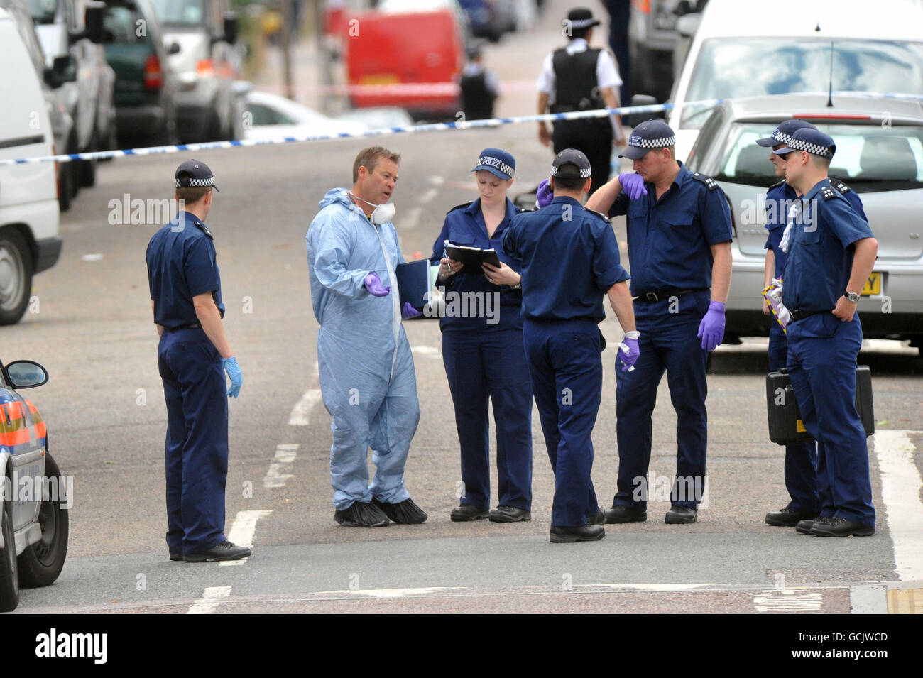 Police officers attend the scene in Gypsy Road, West Norwood, after a ...
