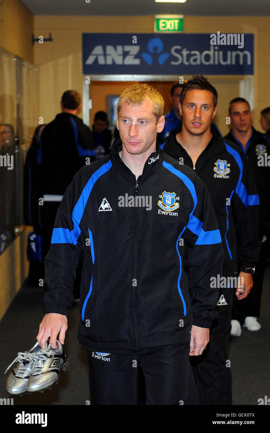 Everton's Tony Hibbert and Phil Jagielka (r) arrive at the ANZ Stadium ...
