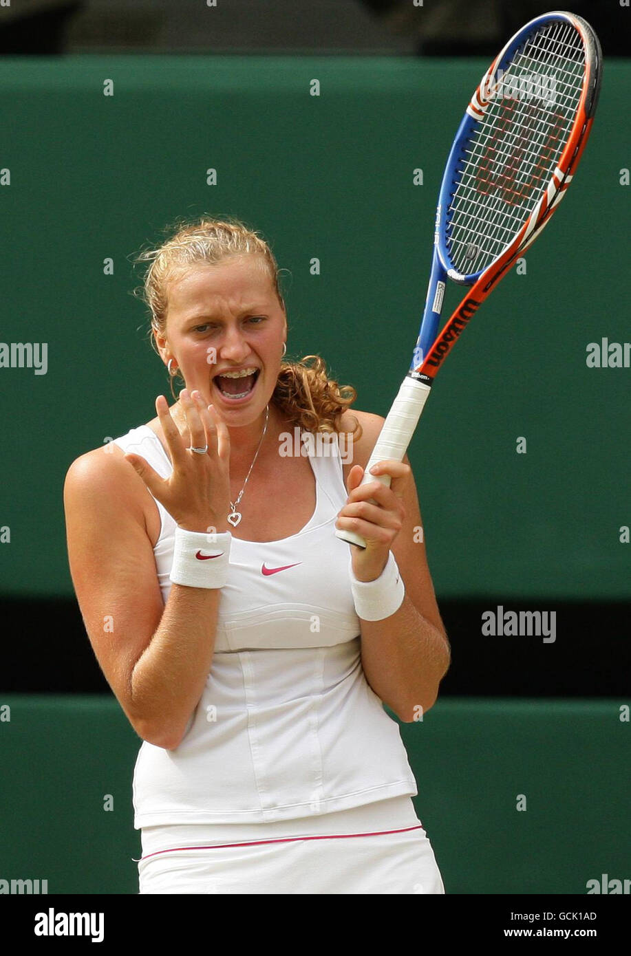 Czech Republic's Petra Kvitova reacts in her match against USA's Serena ...