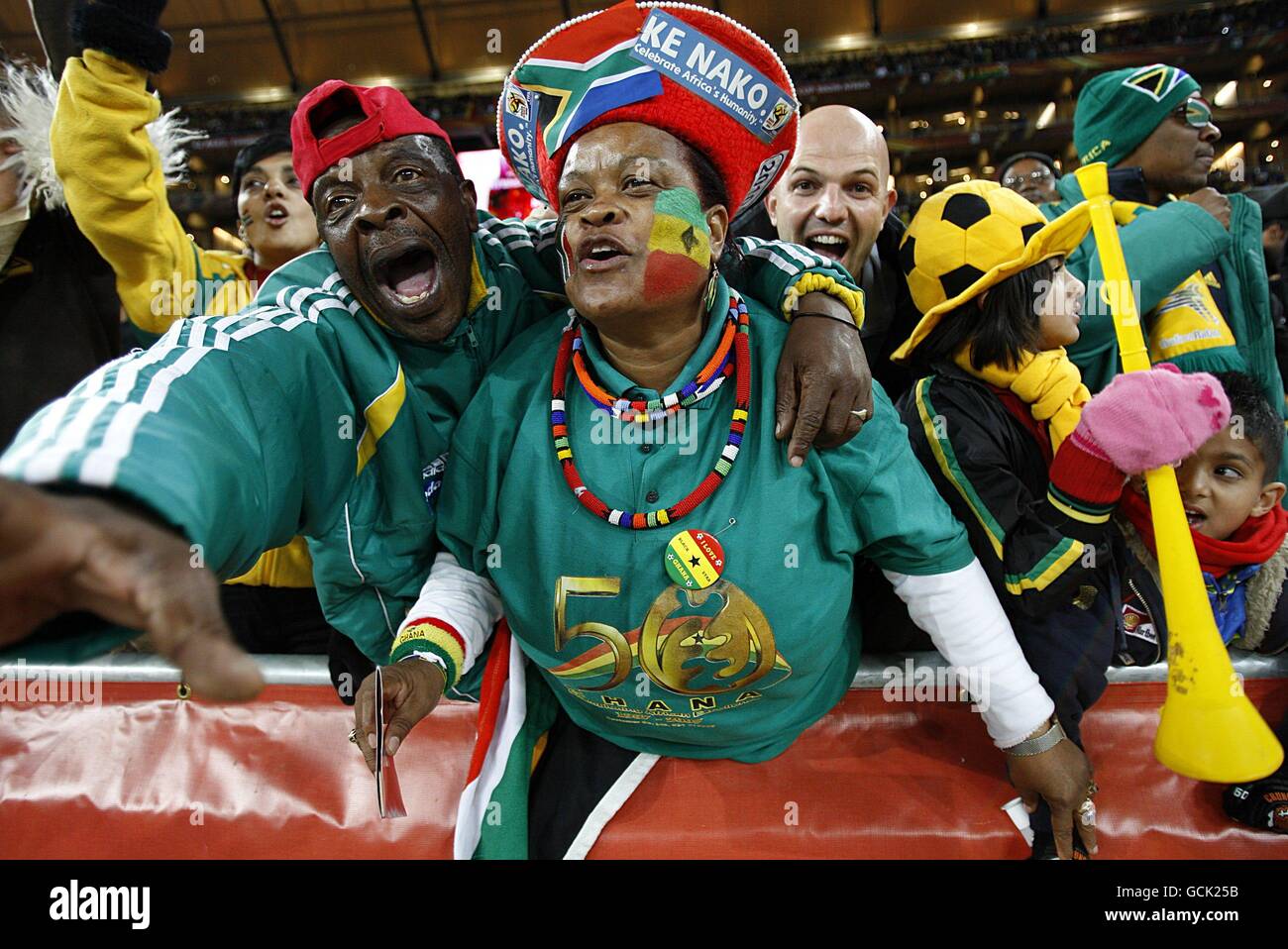 Ghana fans celebrate their opening goal in the stands hi-res stock ...