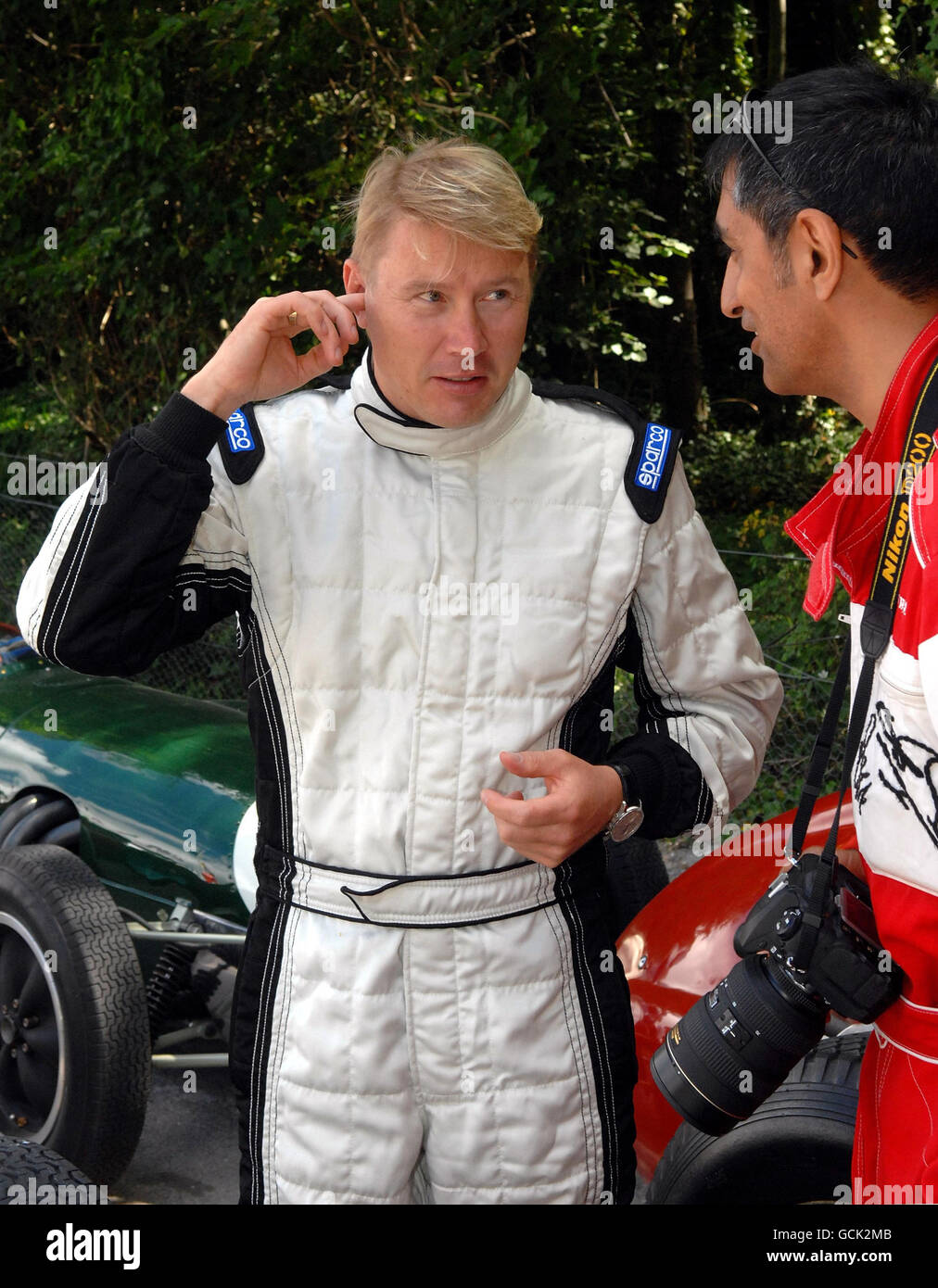 Mika Hakkinen arrives at the top of the hill climb event at the ...