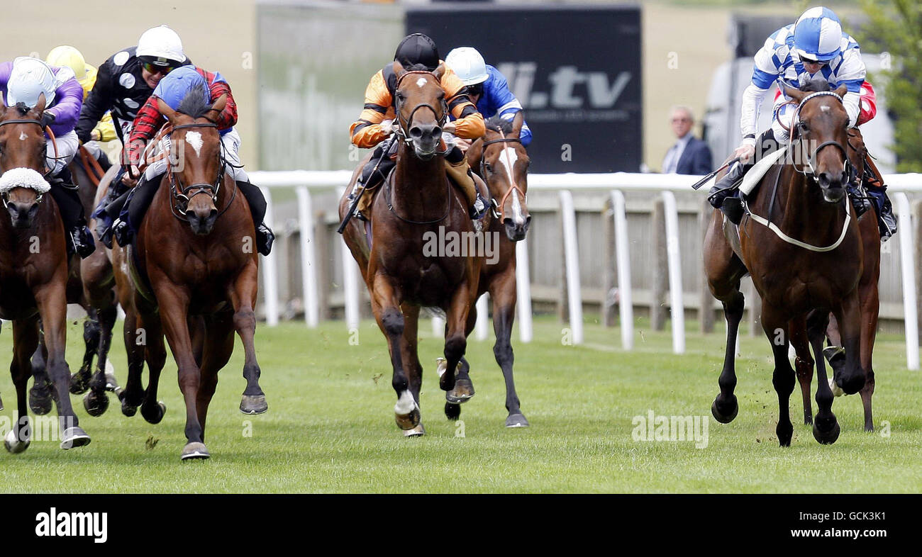 Folly Bridge ridden by Steve Drowne (right) wins the Champagne Lanson E ...