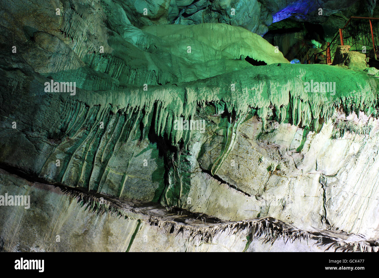 Colorful cave stalactites formation. Close up of colorful natural ...