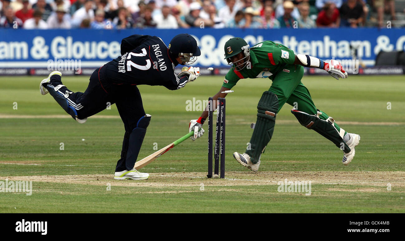 Bangladesh's Jahurul Islam (right) makes his ground as England's Craig ...
