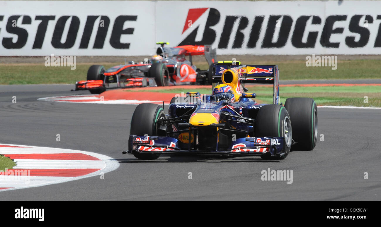 Red Bull's Mark Webber leads McLaren's Lewis Hamilton (behind) on his ...